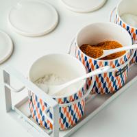 China Convenient Diamond Pattern Ceramic Spice Container With Spoon And Lid Multifunctional for sale
