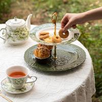China Other Volume Creative Ceramic Cake Stand 2 Tier Designer For Party Dessert Stand for sale