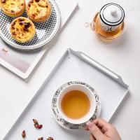 China Sustainable Ceramic Tea Set Porcelain Teapot And Cup With Infuser Strainer for sale