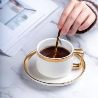 China Matte White Ceramic Porcelain Coffee Tea Cups Saucers Sets With Gold Handle 250ml Volume for sale