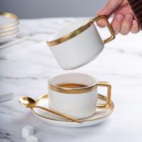 China Matte White Ceramic Porcelain Coffee Tea Cups Saucers Sets With Gold Handle 250ml Volume for sale