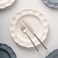 China Solid Color Dinnerware Set Nordic Style Ceramic Plates And Bowls With Sunflower Shape for sale