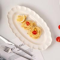 China Solid Color Dinnerware Set Nordic Style Ceramic Plates And Bowls With Sunflower Shape for sale
