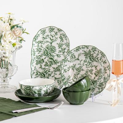 China Restaurant Occasion Luxurious Green Ceramic Dinner Set With Flower Design for sale