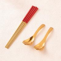 China Party Essential Stainless Steel Gold Spoon Set With Red Chopsticks Chinese Style for sale