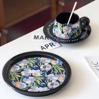 China Black Ceramic Coffee Cups With Saucer And Dessert Plate Flower Design Latte Art Cups for sale