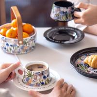 China Black Ceramic Coffee Cups With Saucer And Dessert Plate Flower Design Latte Art Cups for sale