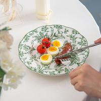 China Sustainable Light Green Ceramic Dinnerware Set With Water Proof Flower Placemat for sale