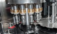 China GX-16-12TS High Speed Follow Type Integrated Filling Capping Machine 10000BPH 380V for sale