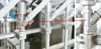 China Piston Liquid Filling Machine Featuring Servo Motor Driven Filling System and PLC Control for Consistent Packaging Output for sale