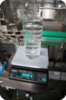 China PLC Controlled Micro-Computer Filling Machine with Electric Scale Weight Feedback and Stainless Steel 304 Frame for sale