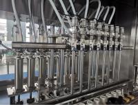 China 8-20 Head Piston Filling Machine for Chemical Liquids 50ml-1000ml Capacity 600-8000 Bottles/Hour for sale