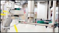 China 5500BPH Automatic Double Head Following Bottle Screw Capping Machine 380V 7.0KW for sale