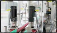 China 5500BPH Automatic Double Head Following Bottle Screw Capping Machine 380V 7.0KW for sale