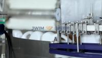 China LP-200E Robotic Bottle Unscrambler Machine 80-1000ml Capacity 10000BPH with Quick Size Changeover for sale
