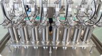 China Automatic Linear Piston Filling Machine 8-20 Heads 50ml-1000ml Capacity 600-8000 Bottles/Hour for sale