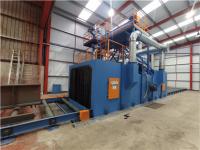 China Steel Structural Sand Shot Blasting Machine Roller Conveyor Type 1.4M/Min Wheel Blasting Machine for sale