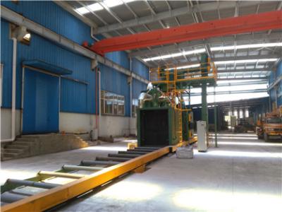 China Roller Conveyor Stone Shot Blasting Machine , Shot Blasting Machine For Casting Descaling for sale
