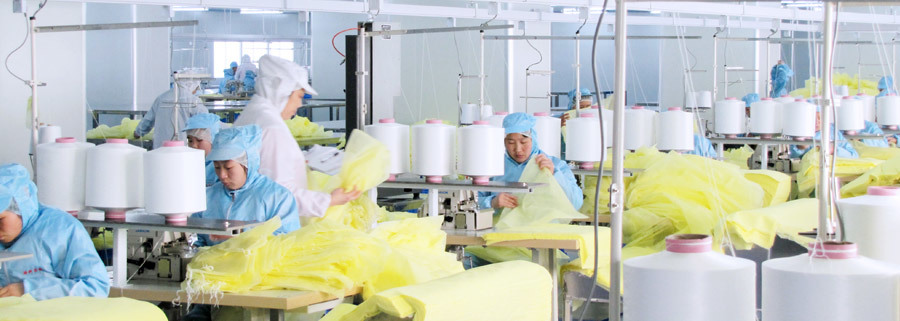 Production and manufacturing of isolation gowns