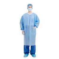 China Soft Blue Medical Lab Coats Knitted Cuff Disposable Gown Protective  Button Style Surgery Gown for sale