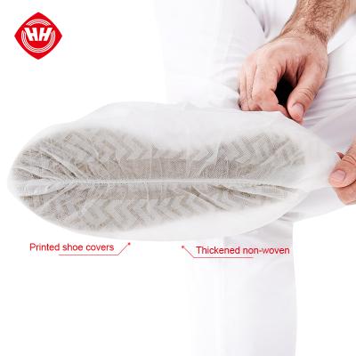 China Hubei Haixin Thickening White Shoe Cover Hand Made Non-Woven Shoe Cover Disposable Shoe Integrated Forming Overshoes Wholesale for sale