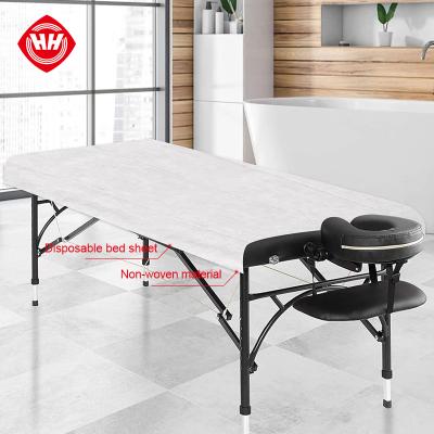 China Hubei Haixin Massage Table Sheets Spa Bed Sheets Black Plastic Tattoo Bed Covers Waterproof Disposable CPE Mattress Cover for sale