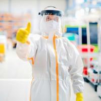 China Yellow Label Disposable Protective Suit with CE Certification and Elastic Cuff for Medical and Industrial Use for sale