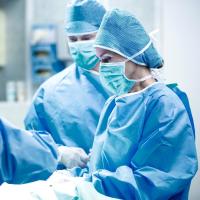 China Haixin TG011R-r Sterile Reinforced Surgical Gown with SMMS Non-woven Fabric and CE Certification for sale