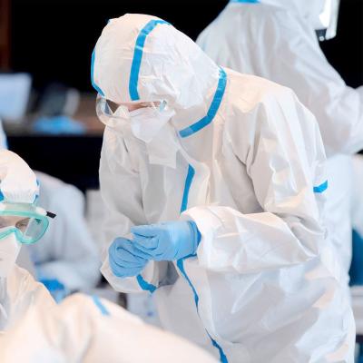 China Type 4/5/6 Certified Protective Coverall with Breathable Microporous Film and Heat-Sealed Blue PE Tapes for sale
