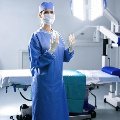 China Disposable SMS Level 4 Surgical Gown with Elastic Cuffs Reinforced Seams and Absorbent Lint-Free Material for sale