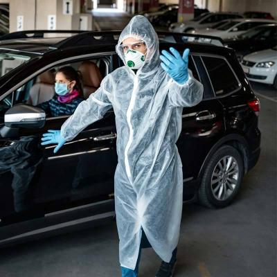 China Medicine-Grade White Translucency Hooded Isolation Gown with CE Certification for Bulk Sale for sale