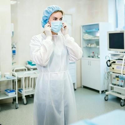 China 48gsm Fluid Resistant Isolation Gown - Breathable SMS Material & AAMI Level 2/3 Certified Disposable Medical Gown for sale