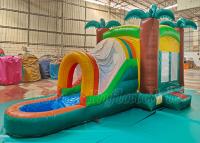 China Tropical Jungle Theme Bounce House Kids Jumping Bouncy Castle Inflatable Bouncer Combo With Pool Water Slide for sale