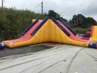 China 0.9mm PVC Tarpaulin Huge Inflatable Water Parks 40m Diameter With Red / Blue Colour for sale