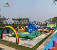 China Outdoor Games Inflatable Slide Park Inflate Large Inflatable Water Slides With Swimming Pool for sale