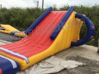 China Triangle Inflatable Water Floating Slide Water Park For Outdoor Games for sale