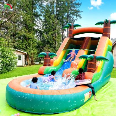 China Commercial Dry and Wet Water Slide Inflatable Tropical Fiesta Breeze Kids Inflatable Water Slide with Pool for sale