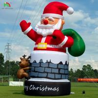 China 20FT 26ft 33ft Inflatable Santa Claus In Chimney With Reindeer Outdoor Christmas Decoration Blow Up Santa Claus for sale