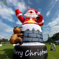 China 20FT 26ft 33ft Inflatable Santa Claus In Chimney With Reindeer Outdoor Christmas Decoration Blow Up Santa Claus for sale