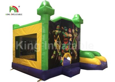 China EN71 Justice League Theme Green Inflatable Jumping Castle With Slide For Kids for sale