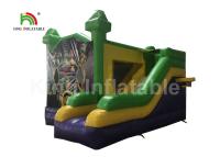 China EN71 Justice League Theme Green Inflatable Jumping Castle With Slide For Kids for sale