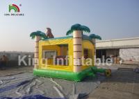 China Palm Tree Yellow Inflatable Kids Jumping Castle With Step And Mesh for sale