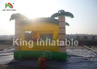 China Palm Tree Yellow Inflatable Kids Jumping Castle With Step And Mesh for sale