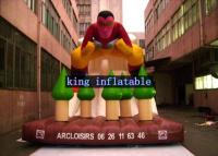 China 7 * 4m OEM & ODM PVC Inflatable Dry Slide With Superman And Green Trees For Rental for sale