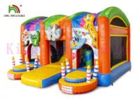 China Colorful Jungle Wild Animal PVC Inflatable Jumping Castle With Slide For Kids for sale
