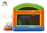 China Colorful Jungle Wild Animal PVC Inflatable Jumping Castle With Slide For Kids for sale