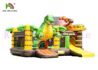 China Dinosaur Theme PVC Blow Up Bouncy Castle With Slide Jungle Adventure For Kids for sale