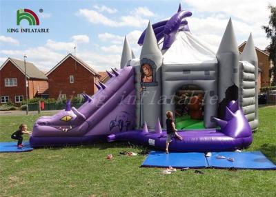 China Purple / Grey Inflatable Jumping Castle With Dragon Slide Roofed Playground for sale