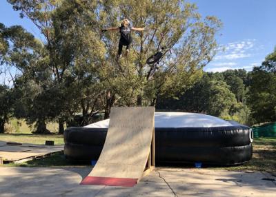 China Black Bicycle Track Air Bag 4.9*3.7*1m Inflatable Sports Games for sale