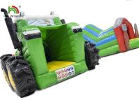 China Logo Printing Green 6.5m Tractor Inflatable Obstacle Course For Party for sale